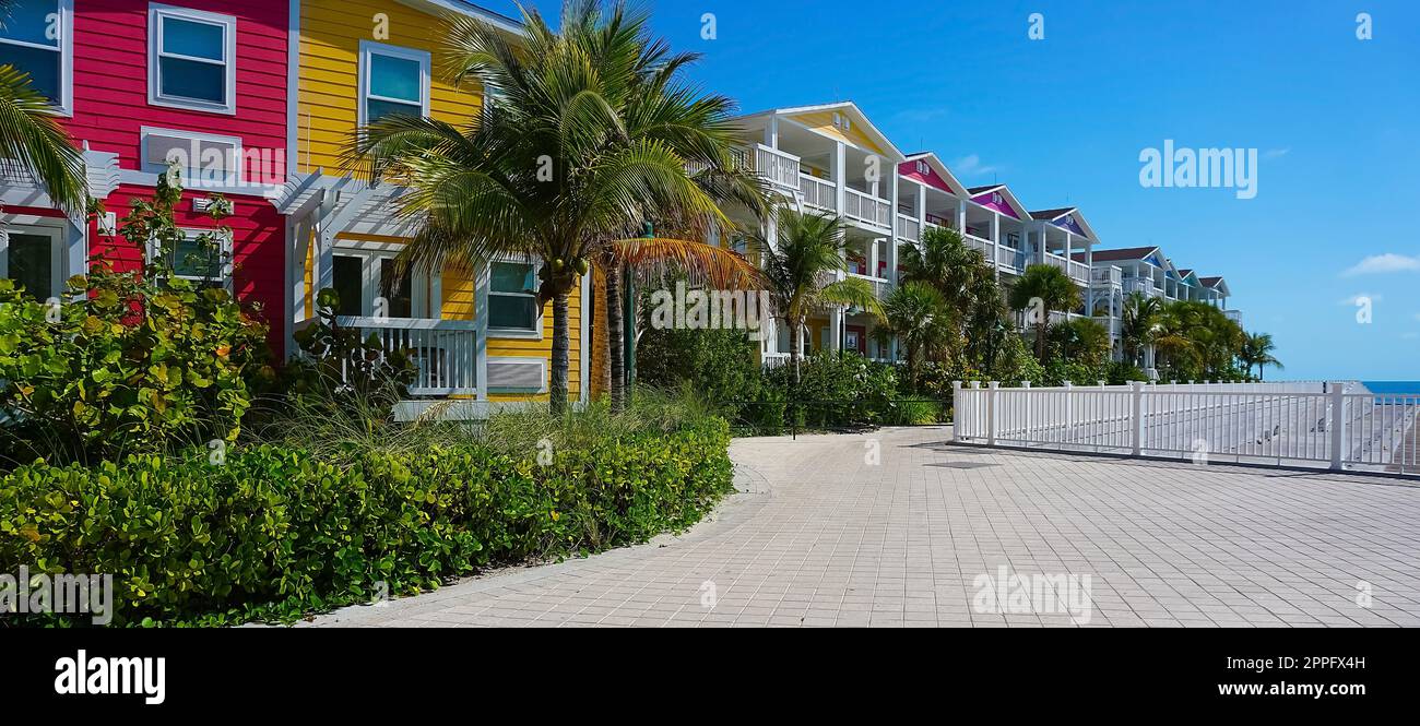 Beach on Ocean Cay Bahamas Island with a colorful houses and turquoise ...