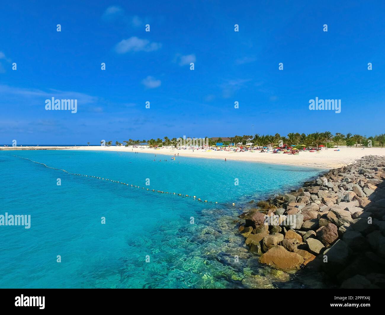 Beach on Ocean Cay Bahamas Island with a colorful houses and turquoise ...