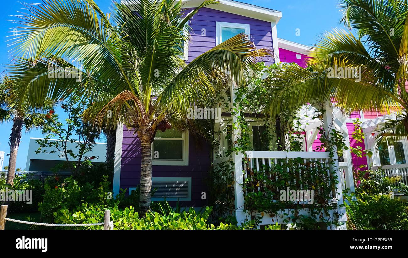 Beach on Ocean Cay Bahamas Island with a colorful houses and turquoise ...
