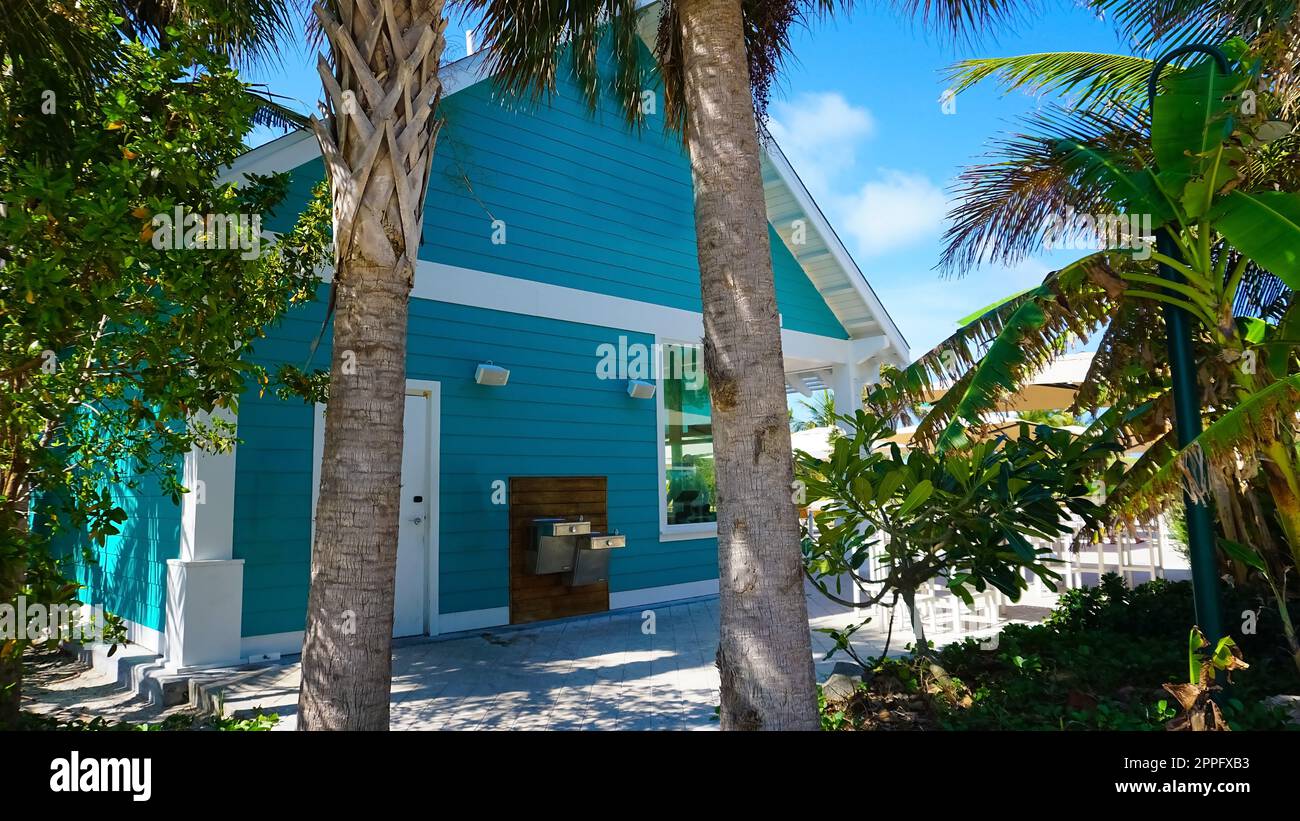 Beach on Ocean Cay Bahamas Island with a colorful houses and turquoise ...