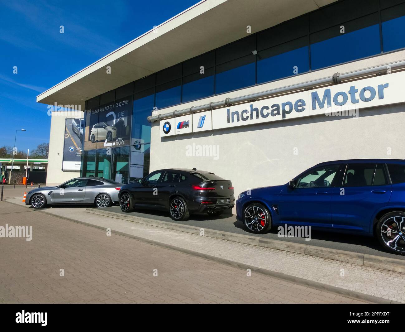 BMW Inchcape Motor car dealership with cars parked on forecourt Stock ...