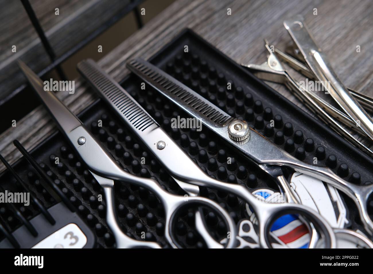 Vintage barber shop tools on old wooden background and rubber mat Stock ...