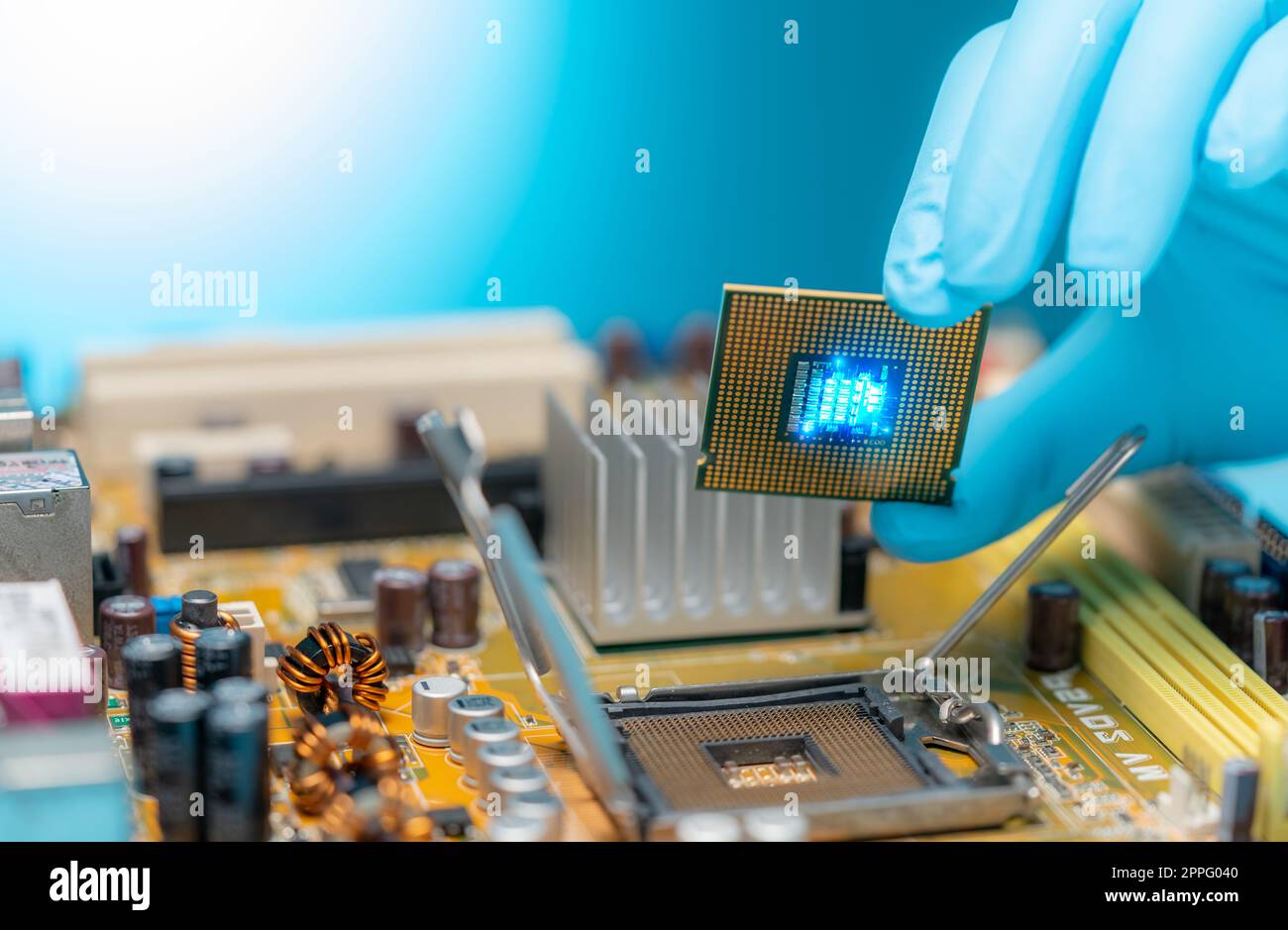 Electronic engineer hand putting computer chip on socket. Chipset on ... Electronic engineer hand putting computer chip on socket. Chipset on ...