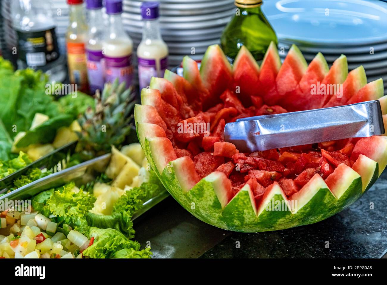 red watermelon and fruit salads on the buffet table Stock Photo - Alamy