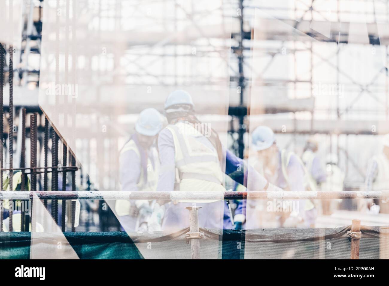 Team of construction worker on construction site Stock Photo - Alamy
