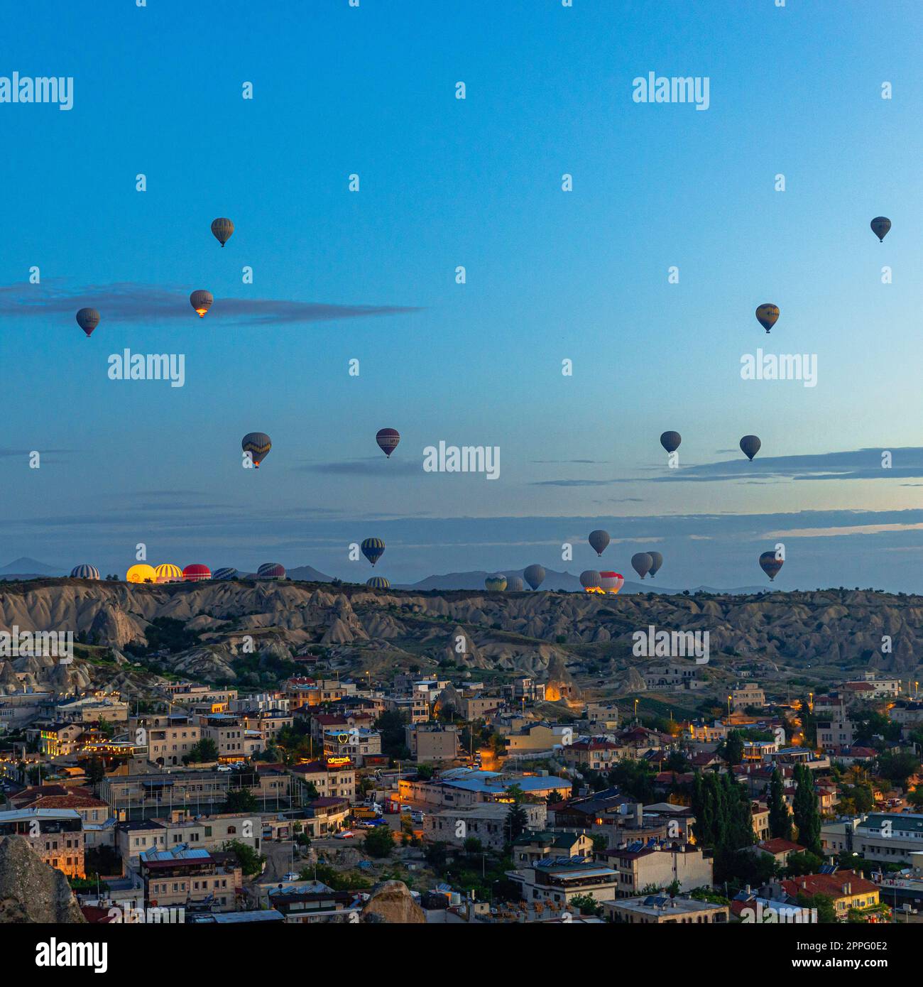 hot air balloons fly at sunrise Stock Photo - Alamy