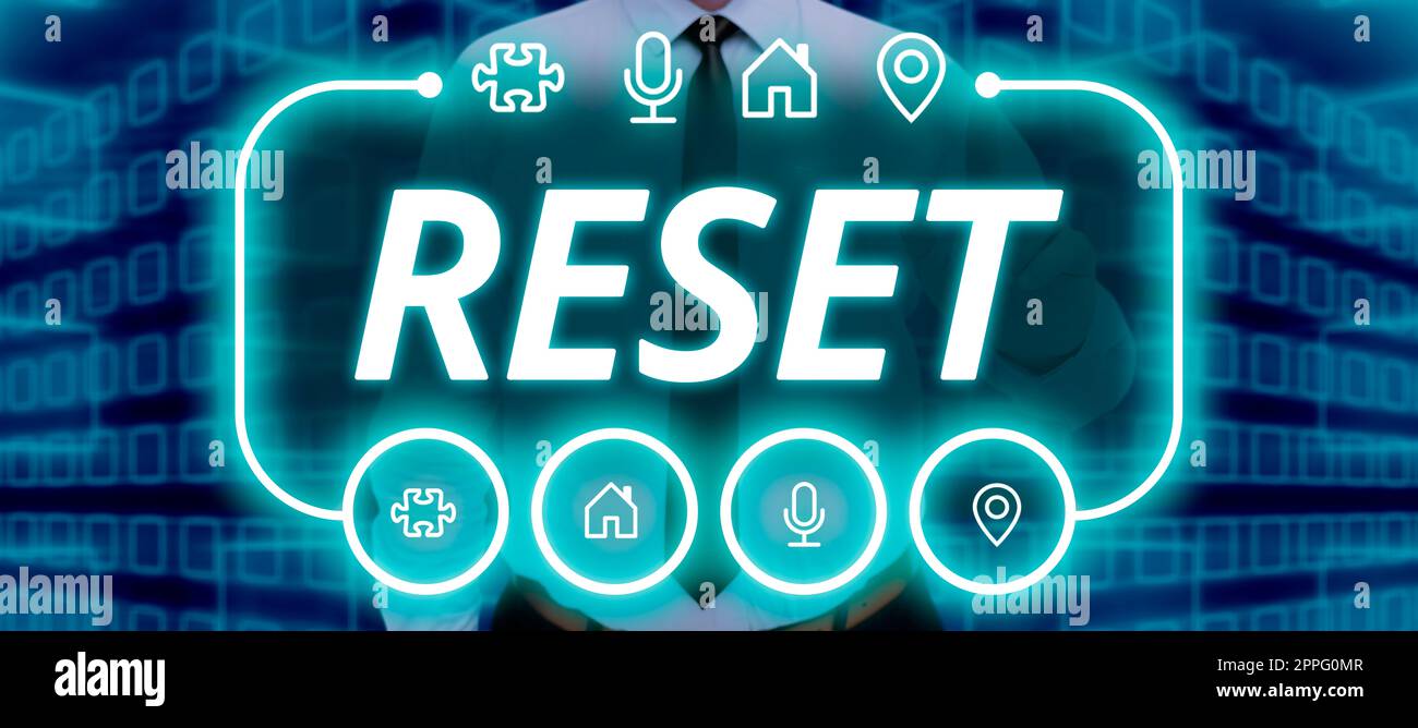 Hand writing sign Reset. Conceptual photo cause device return to its ...