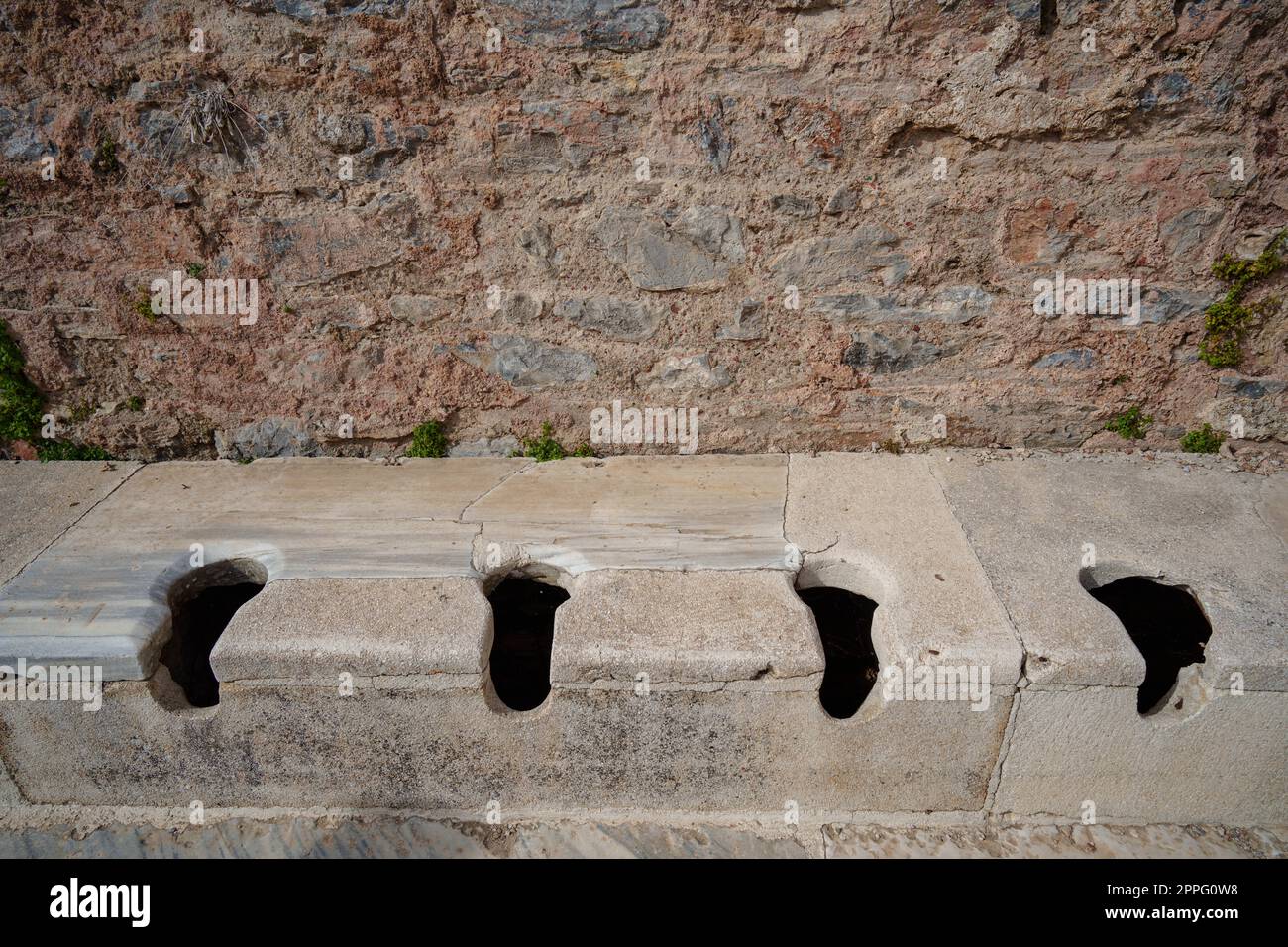 Roman public toilet Stock Photo - Alamy