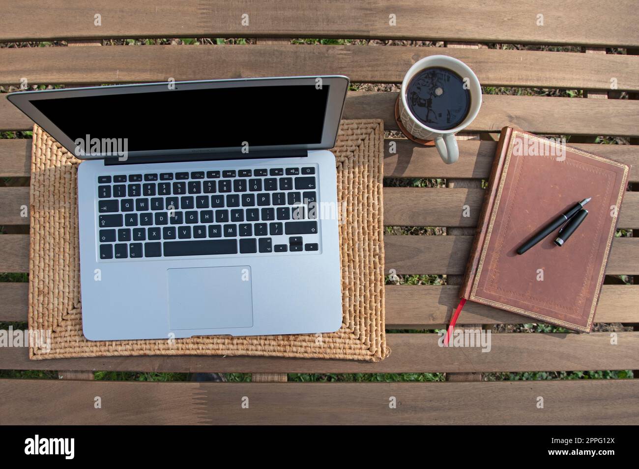 Laptop garden table hi-res stock photography and images - Alamy