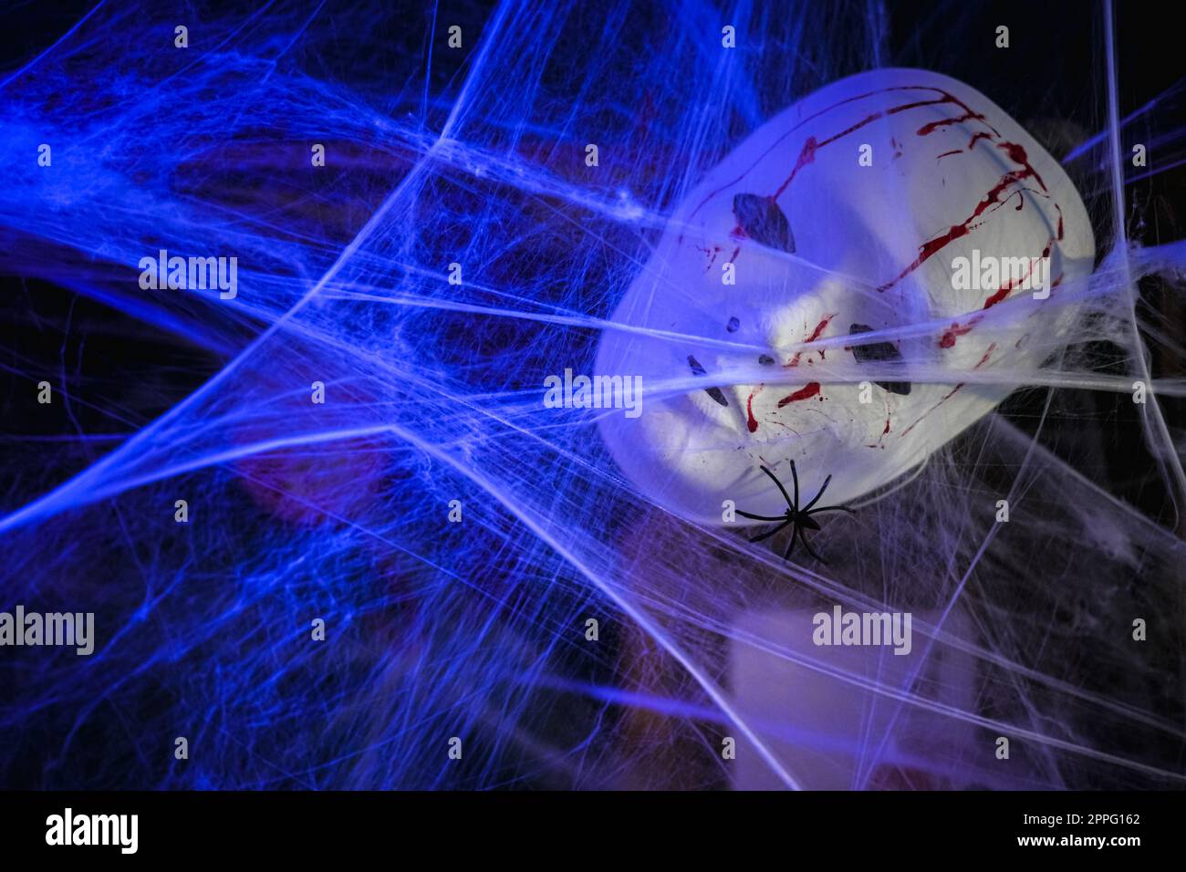 Color image of a white mask, painted with blood Stock Photo - Alamy