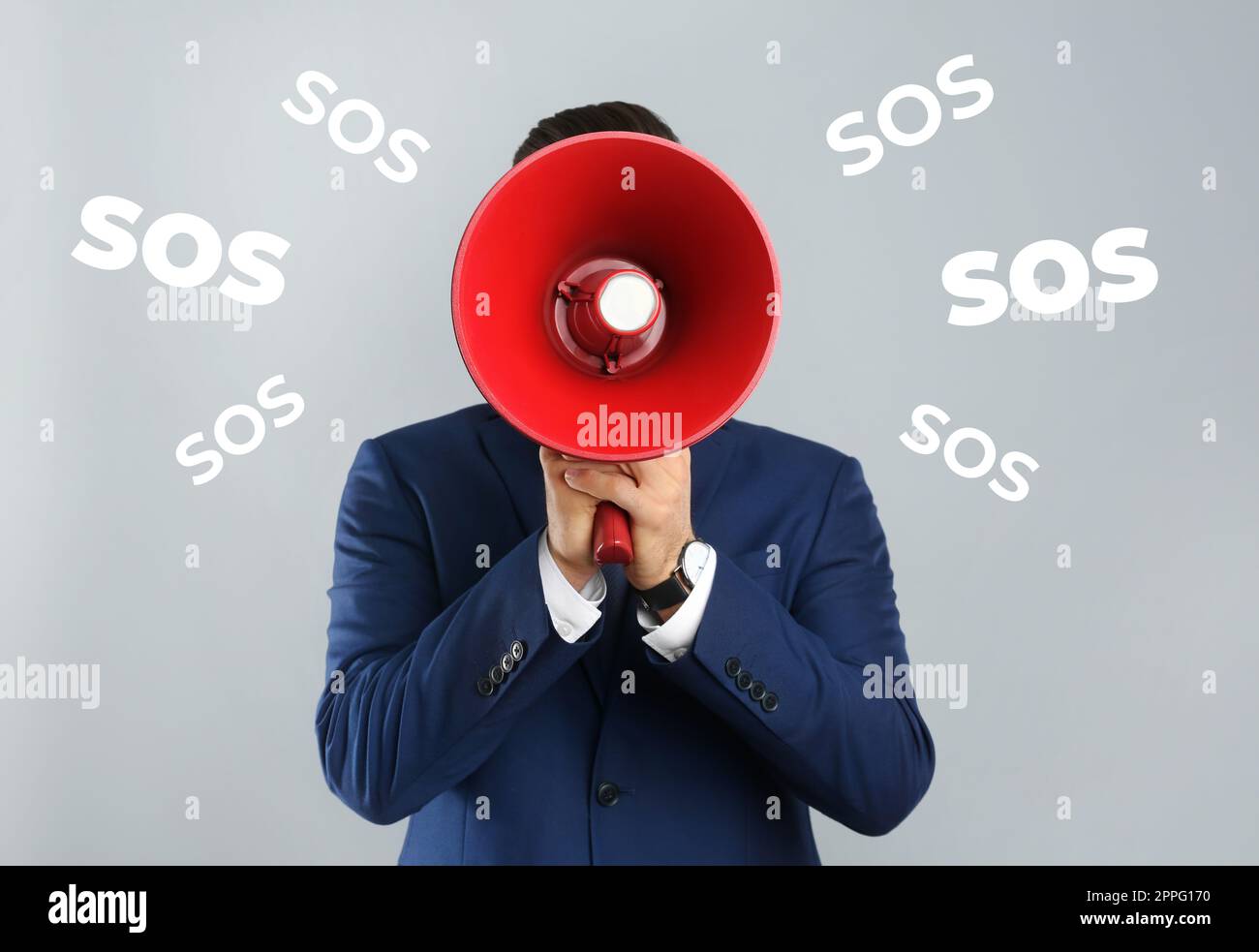 Man with megaphone and words SOS on grey background. Asking for help ...