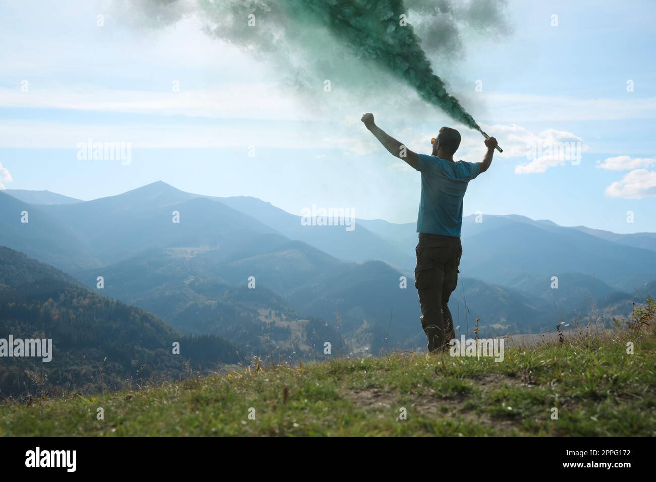 Person holding smoke bomb hi-res stock photography and images - Alamy