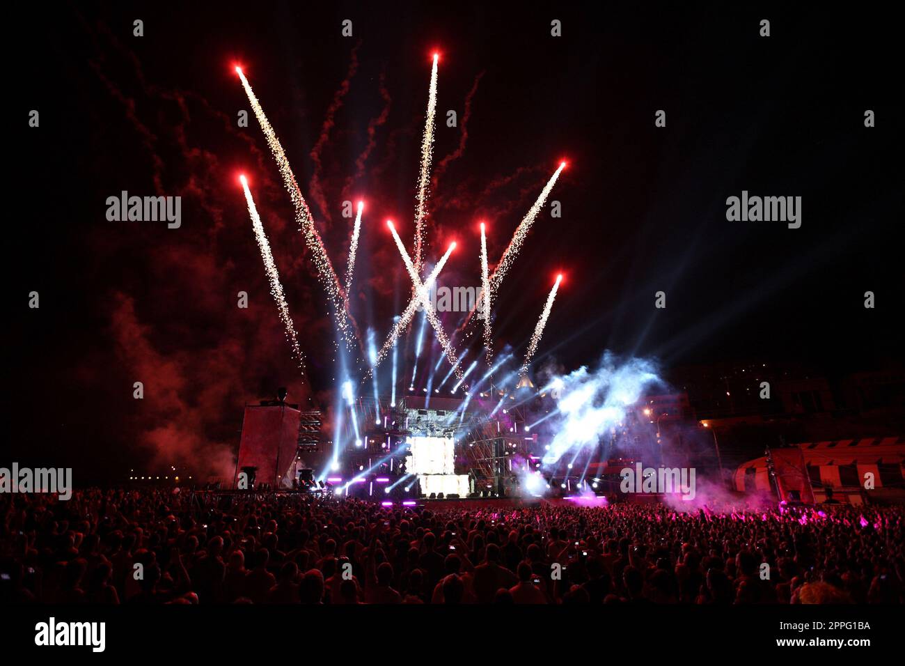 salute and fireworks on a music stage with spotlights at night Stock ...