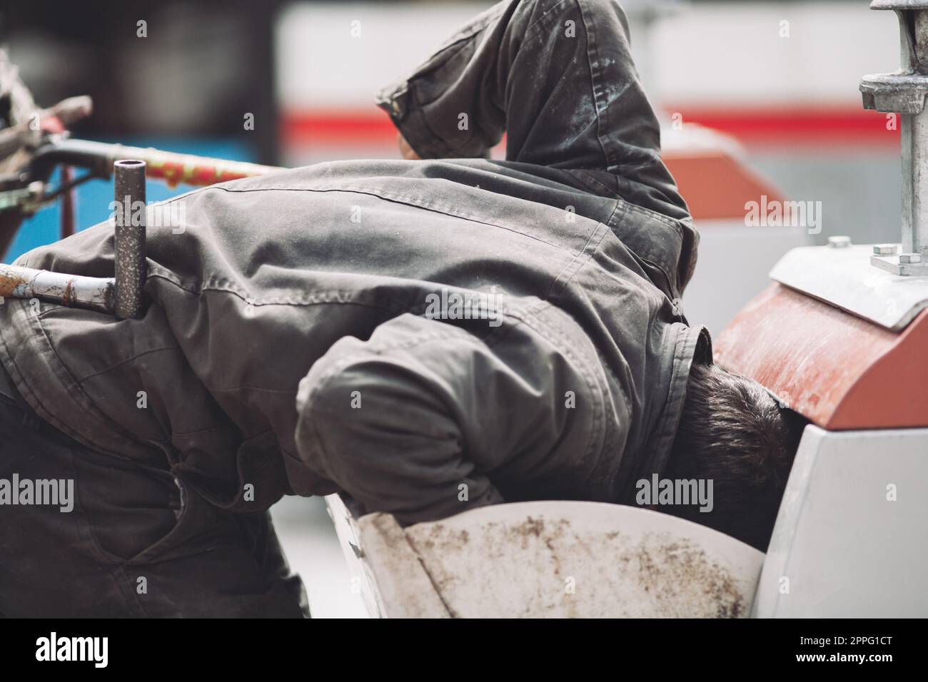Man in garbage can hi-res stock photography and images - Alamy