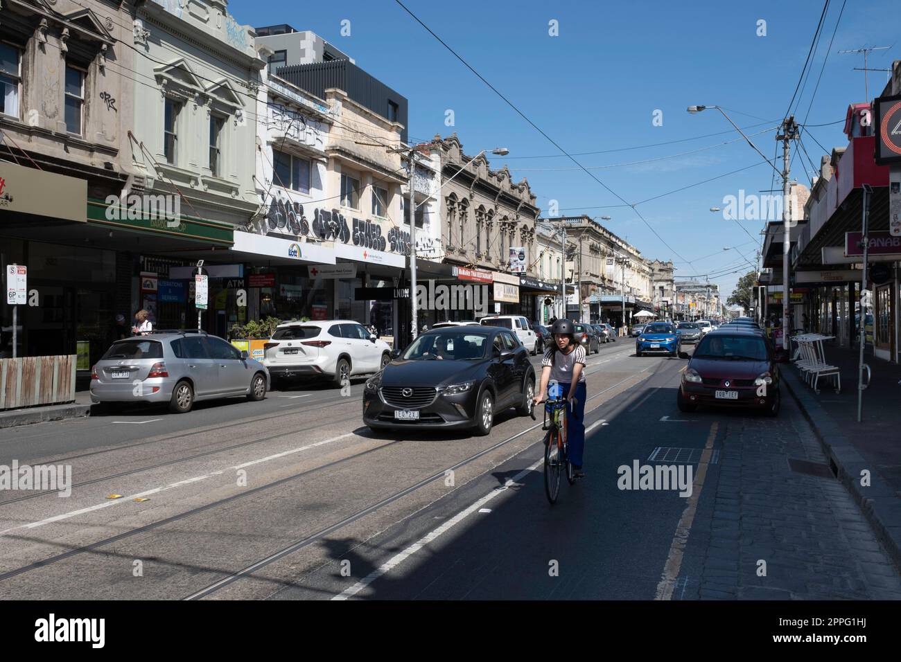 Busy Brunswick street in Fitzroy, the most trendy inner-city district ...