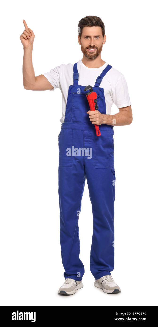 Professional plumber with pipe wrench on white background Stock Photo ...