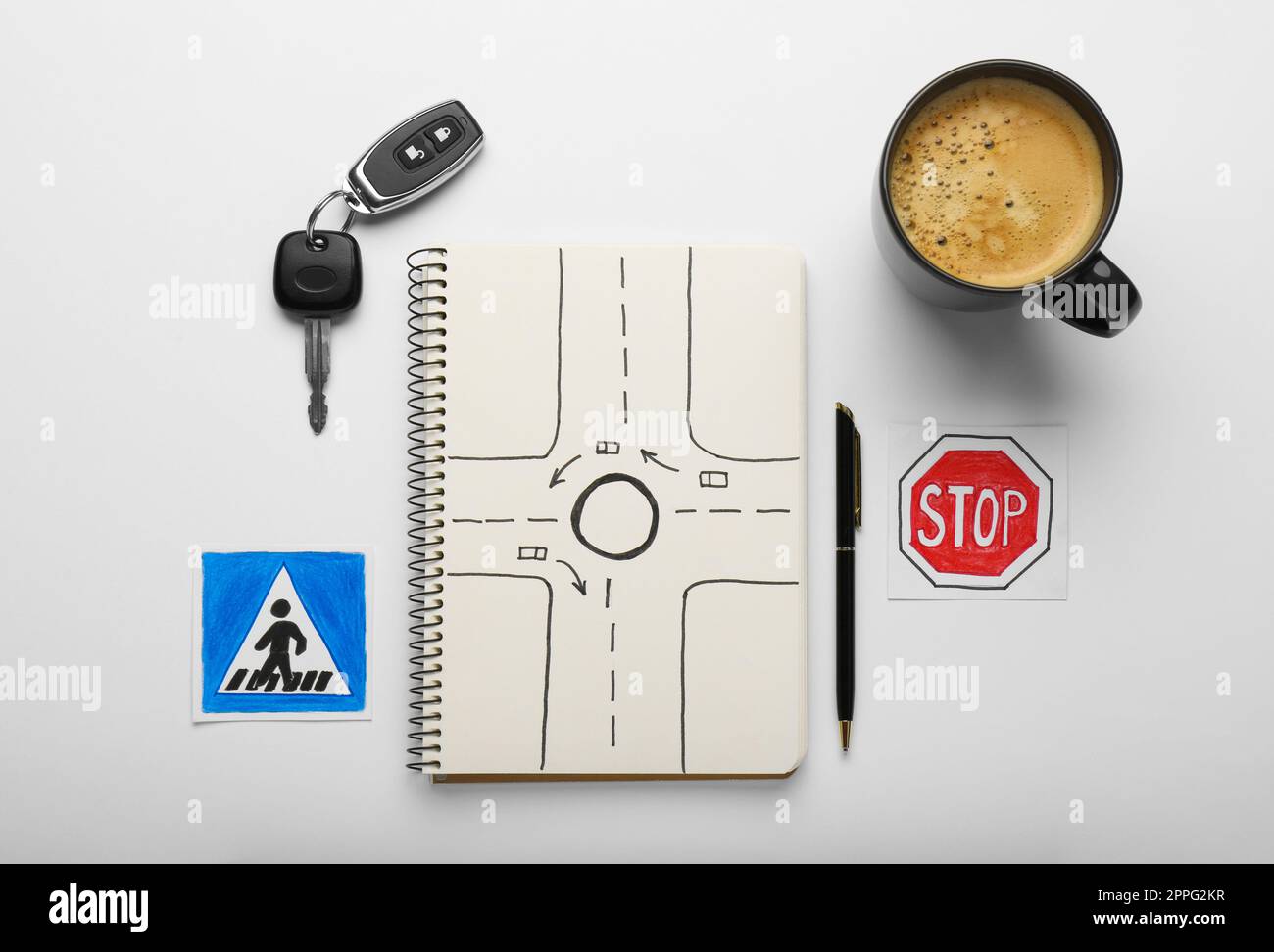 Composition with workbook for driving lessons on white background, top ...
