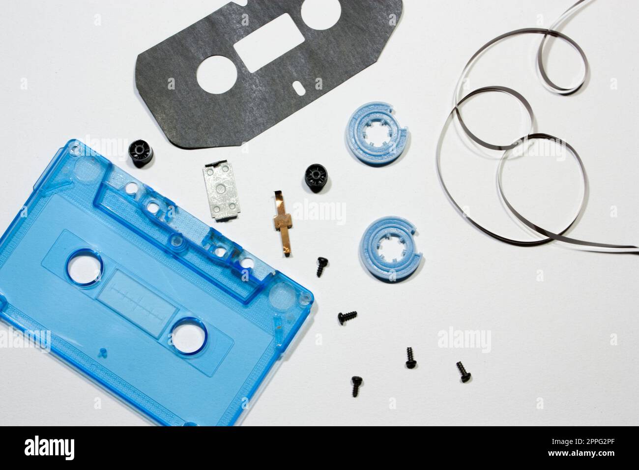 parts of cassette tape on white background Stock Photo - Alamy