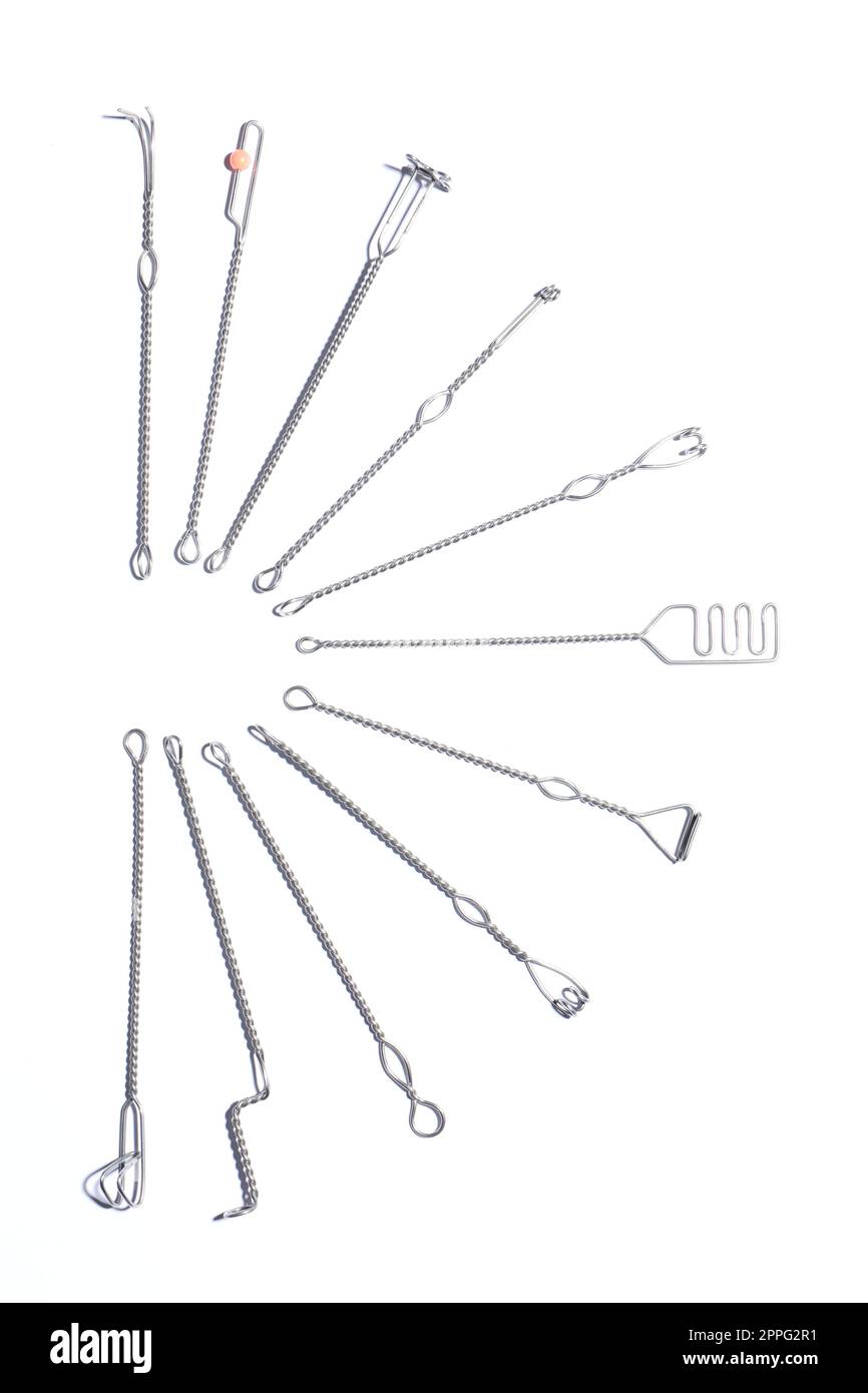 Set of logopedic probes on white background, top view. Speech therapist ...