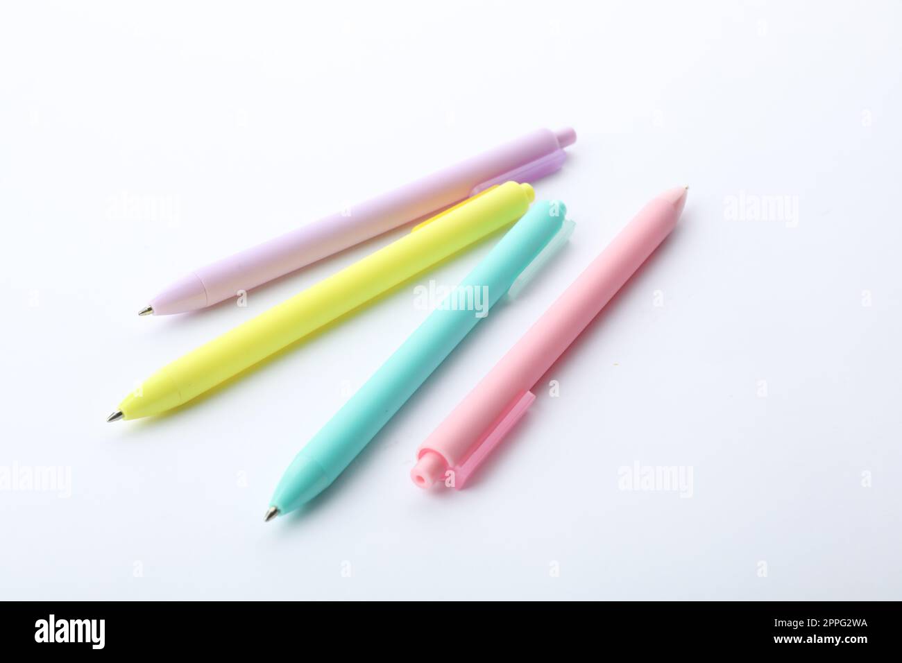 Set of colorful retractable pens isolated on white Stock Photo - Alamy