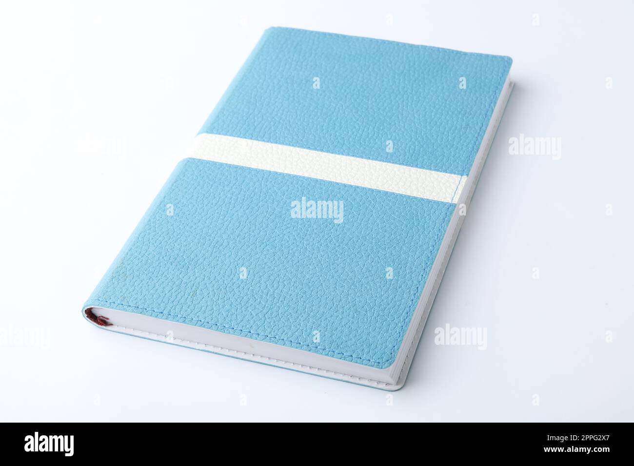 Stylish light blue notebook isolated on white Stock Photo - Alamy