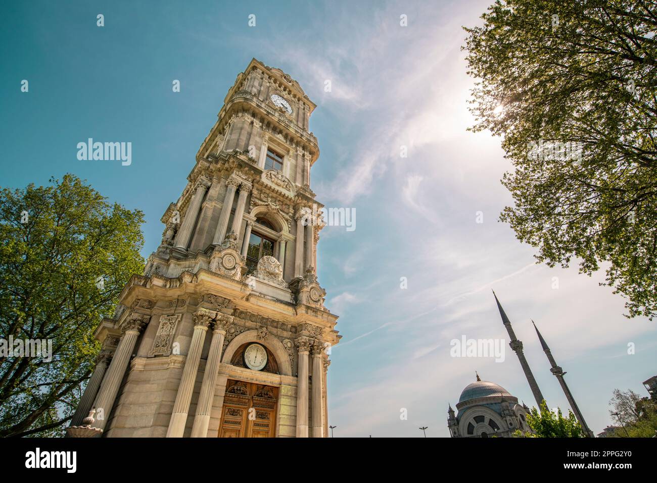 Dolmabahce Clock Tower with blue sky, Istanbul, Turkey Stock Photo - Alamy
