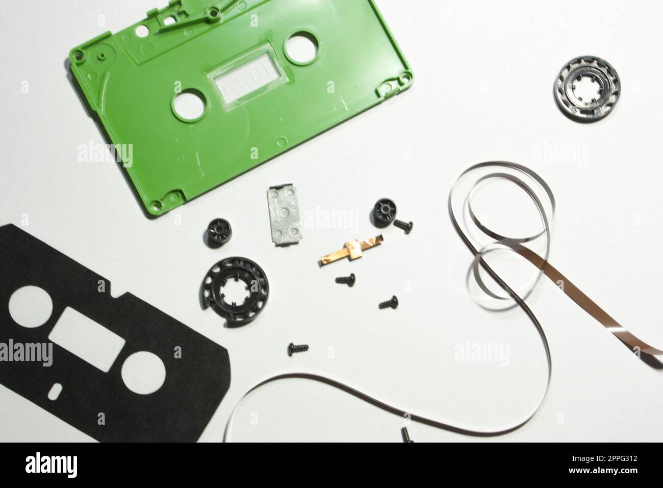 parts of cassette tape on white background Stock Photo - Alamy