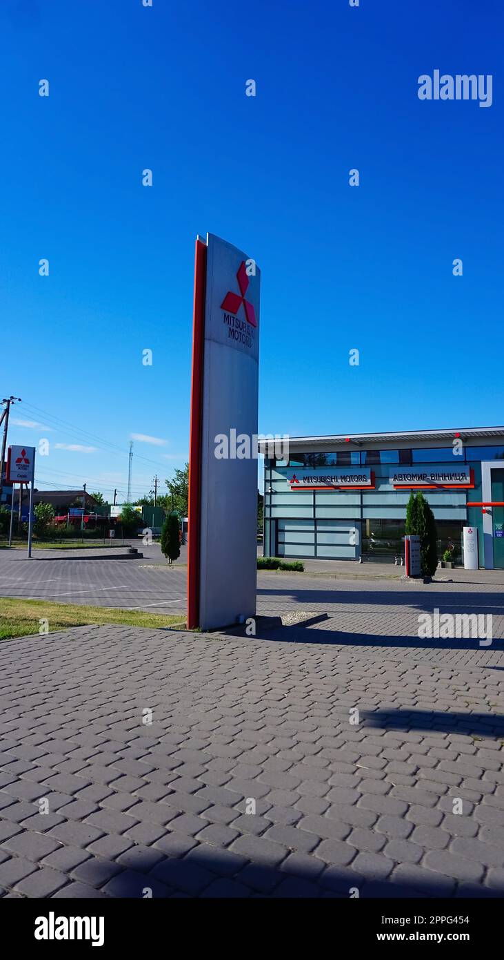 Sign at the entrance to the official Mitsubishi dealership. Mitsubishi ...