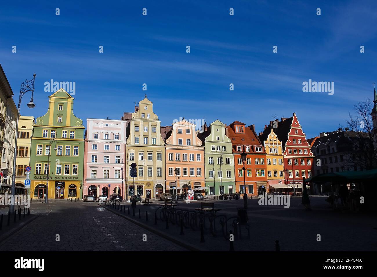 old town hall building with a clock in the center on Wroclaw Square ...