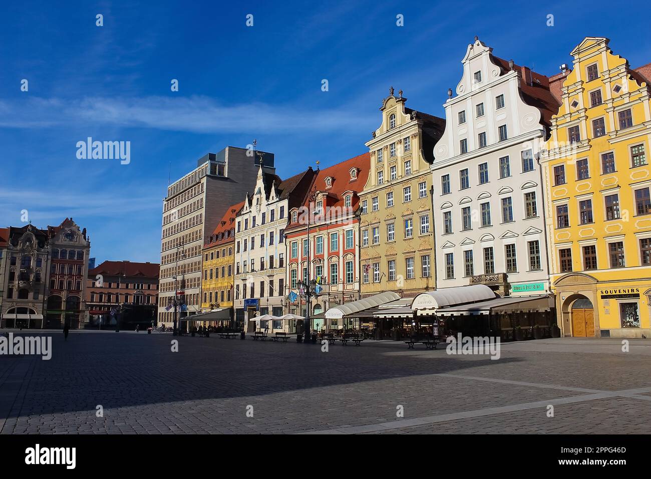 old town hall building with a clock in the center on Wroclaw Square ...