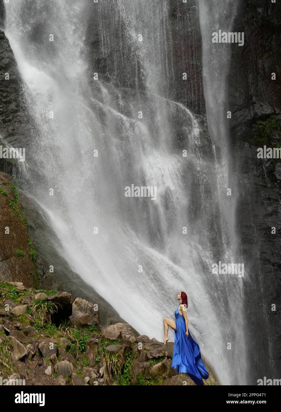 KEDA,GEORGIA -03 MAY, 2023: girl enjoying under Makhuntseti waterfall ...