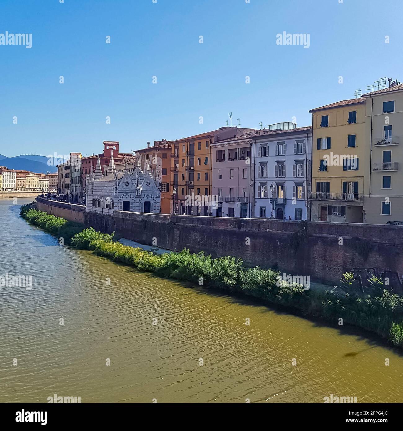 Arno river and vintage architecture of Pisa, Tuscany, Italy Stock Photo ...