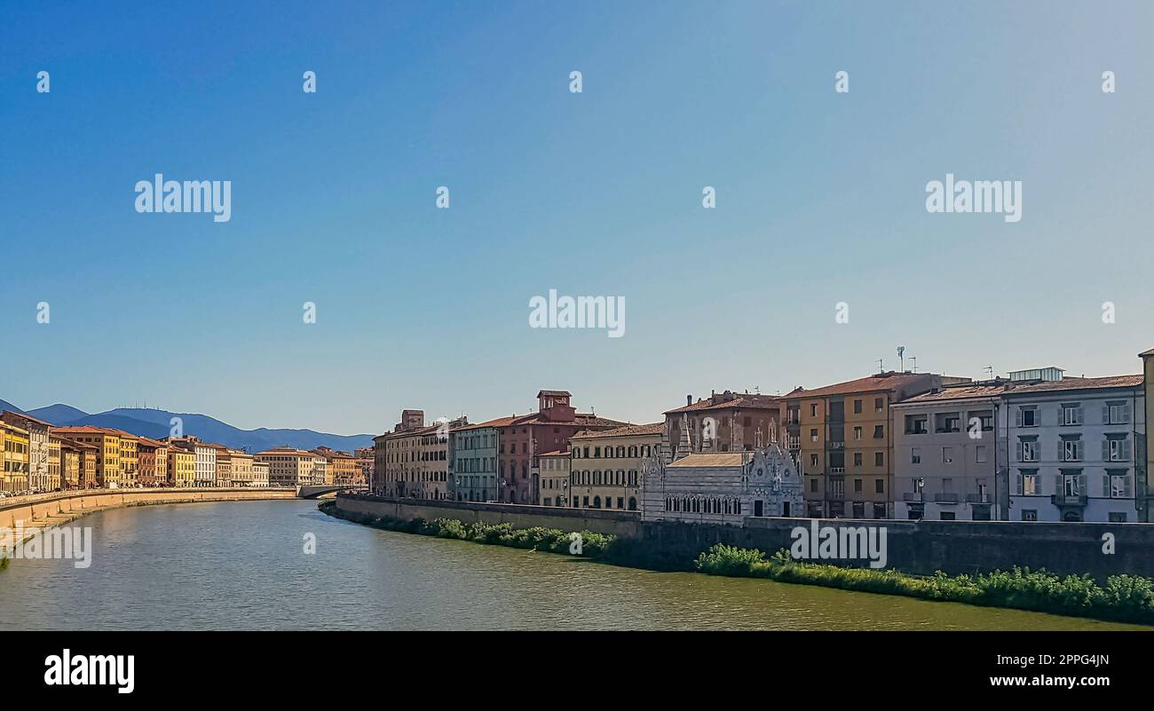 Arno river and vintage architecture of Pisa, Tuscany, Italy Stock Photo ...