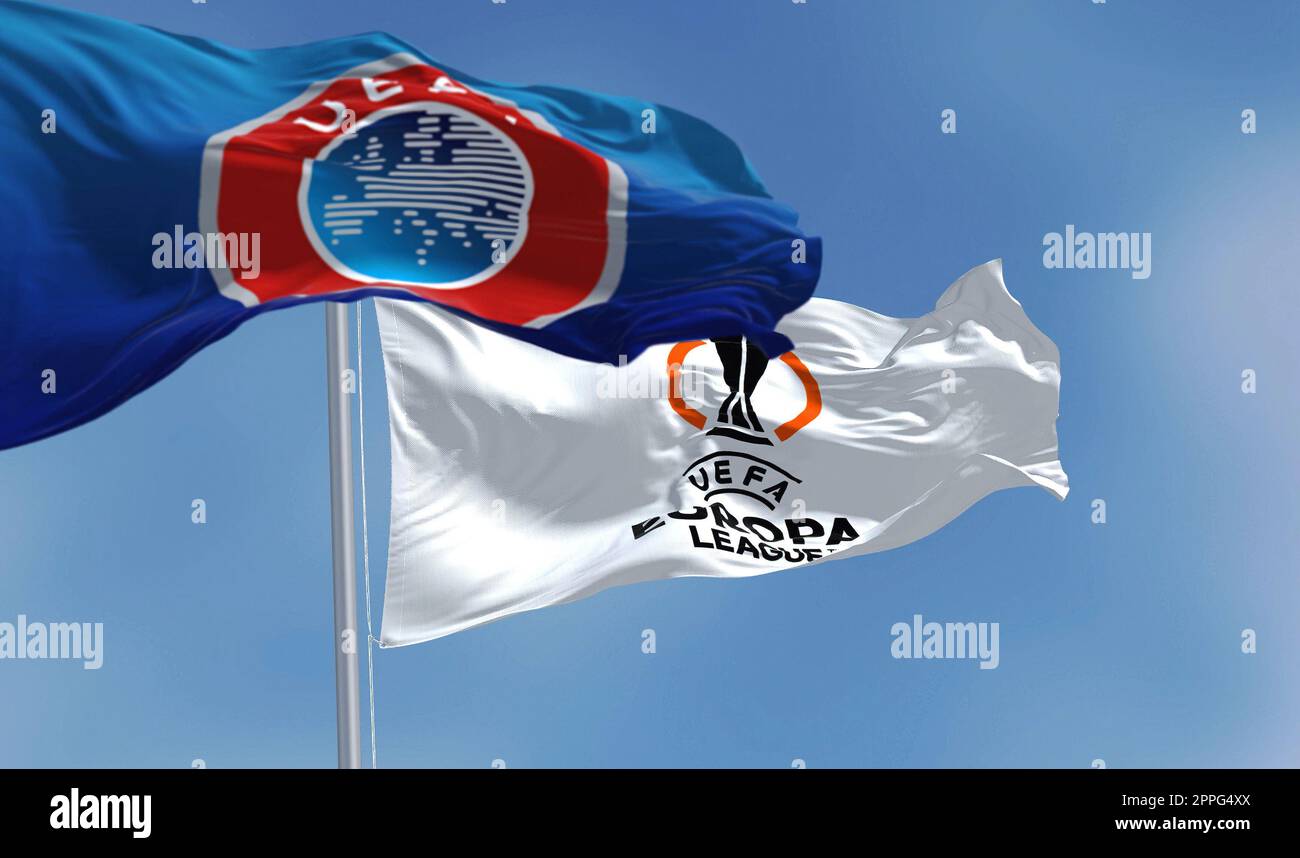 Flags with UEFA and UEFA Europa League waving in the wind on a clear ...