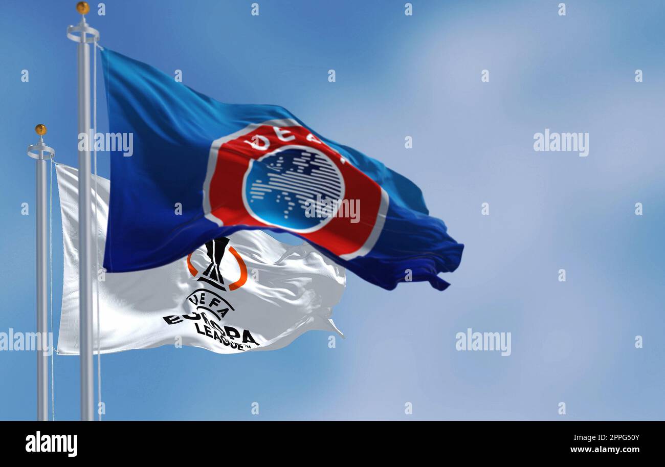 Flags with UEFA and UEFA Europa League waving in the wind on a clear ...
