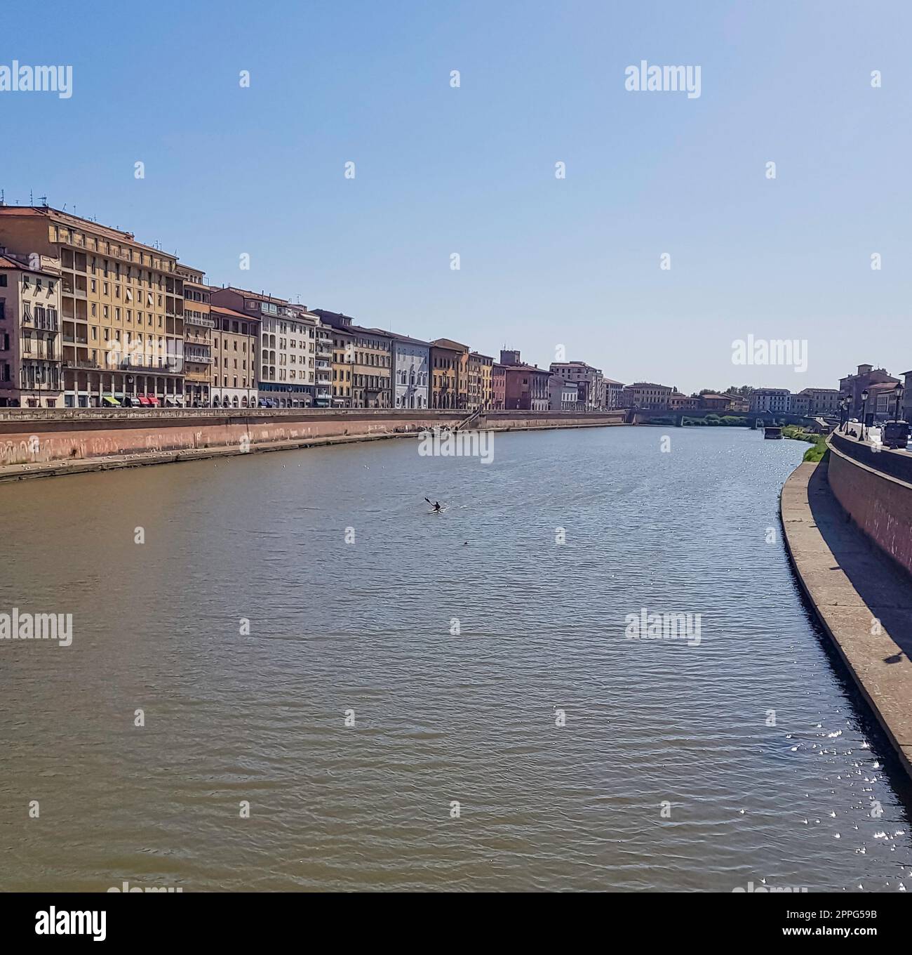 Arno river and vintage architecture of Pisa, Tuscany, Italy Stock Photo ...