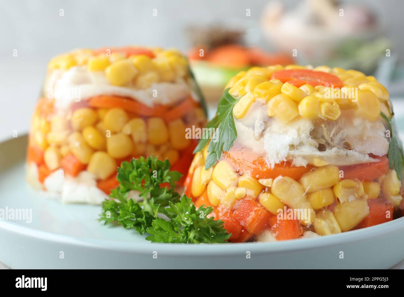 Delicious fish aspic with vegetables on plate, closeup Stock Photo - Alamy