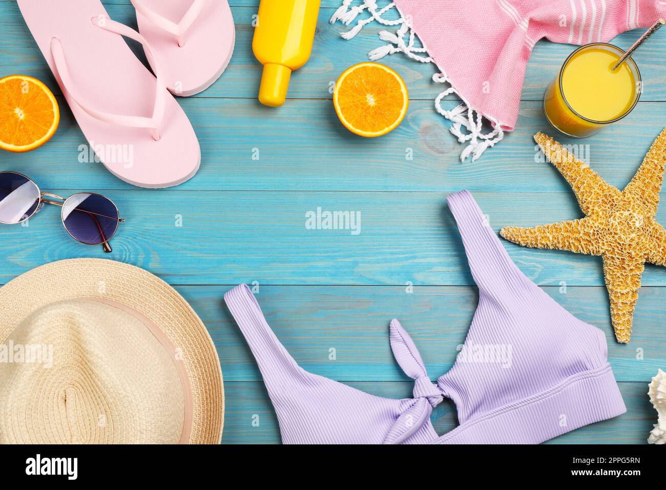 Frame of beach objects on turquoise wooden background, flat lay. Space ...