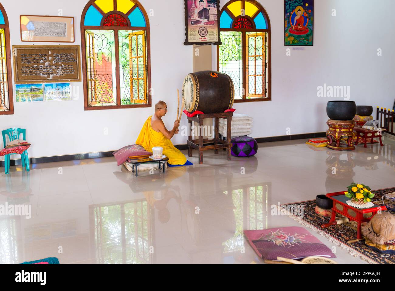 Buddhist monk in the temple of the Japanese Peace Pagoda in Unawatuna ...