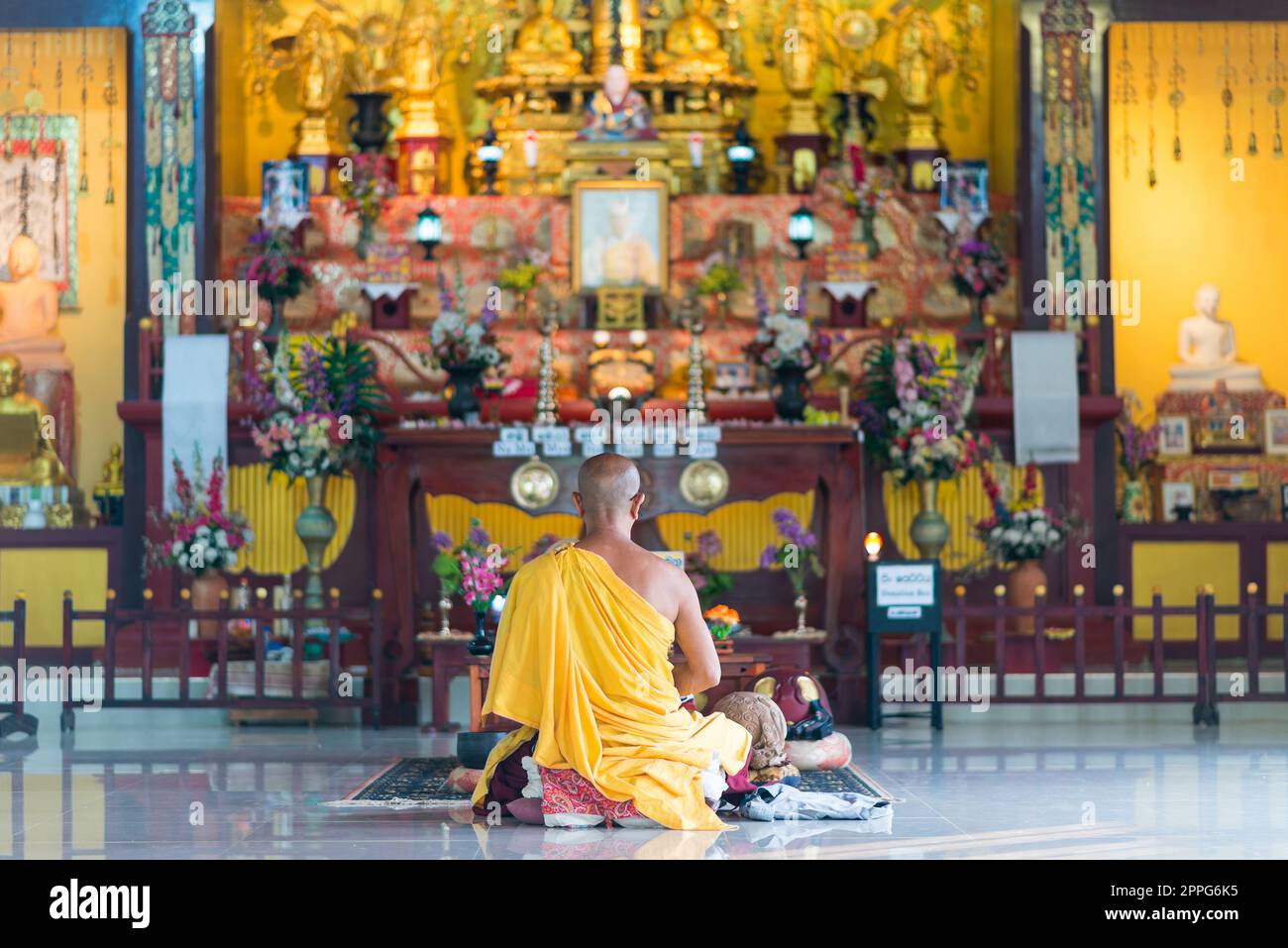 Buddhist monk in the temple of the Japanese Peace Pagoda in Unawatuna ...