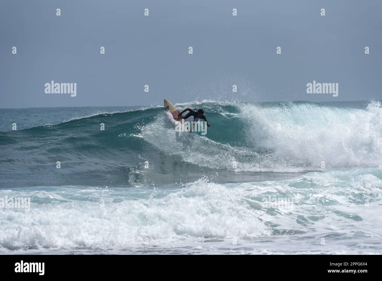 server on the beach in Puerto Viejo, Limon, Costa Rica Stock Photo - Alamy