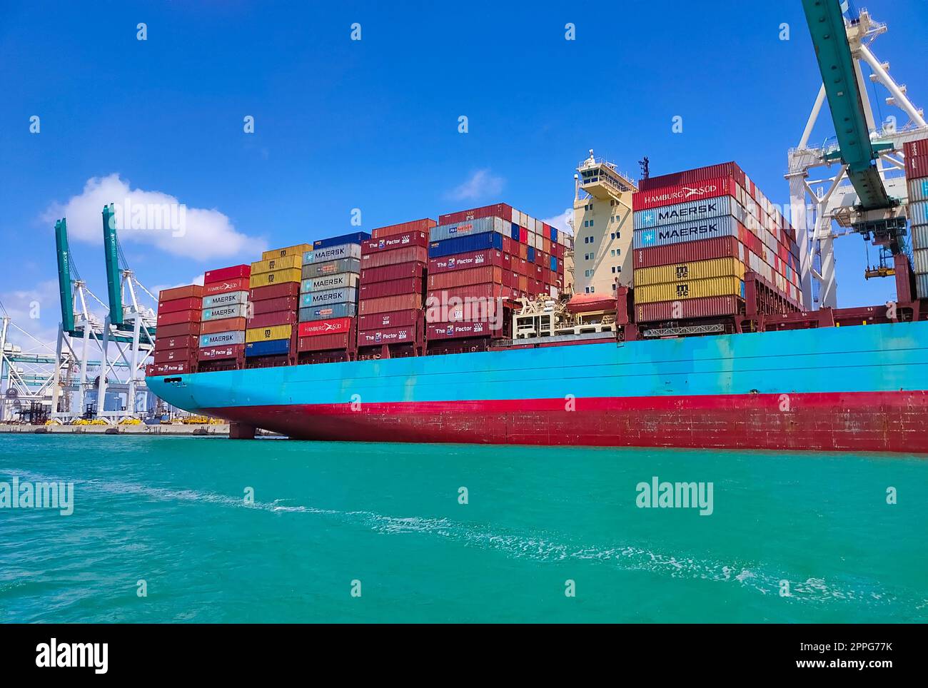 Container ship at Port Miami, one of the largest cargo ports in the US ...