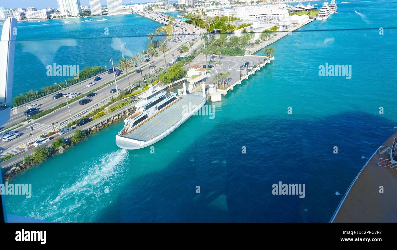 Ferry carrying vehicles to Fisher Island in Miami, Florida Stock Photo ...