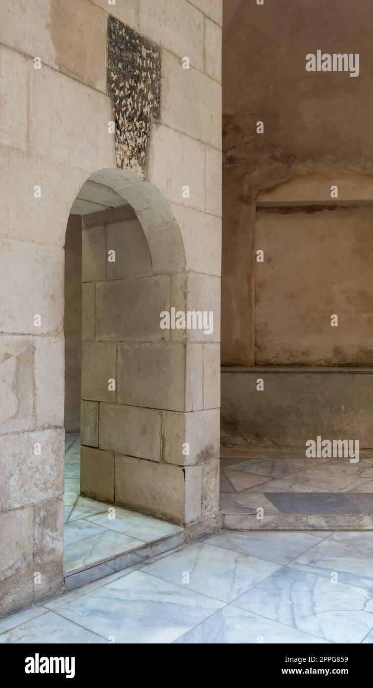 Aged narrow vaulted passage and stone bricks wall Stock Photo - Alamy