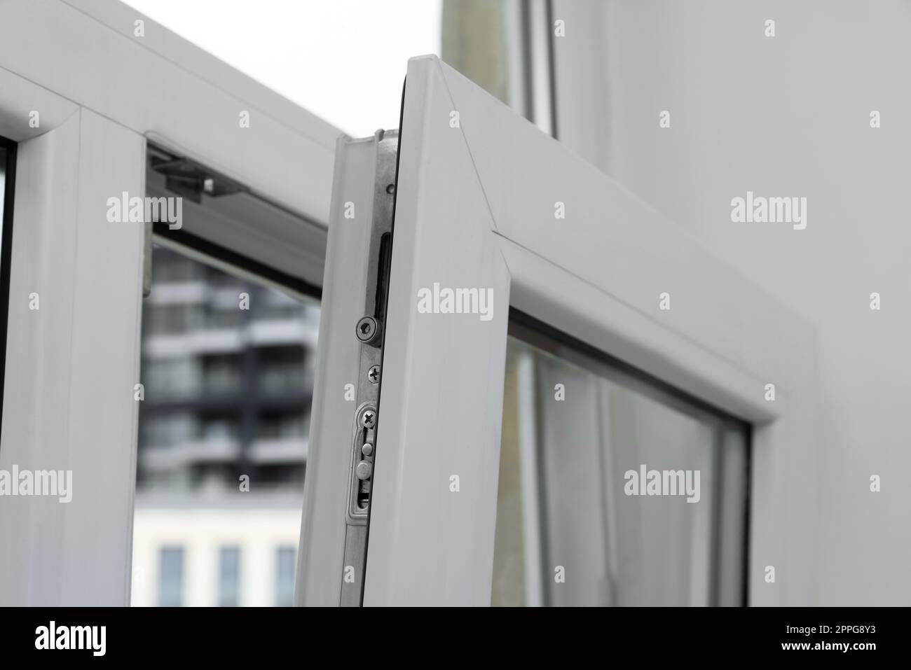 Open window with white plastic frame indoors, closeup Stock Photo - Alamy