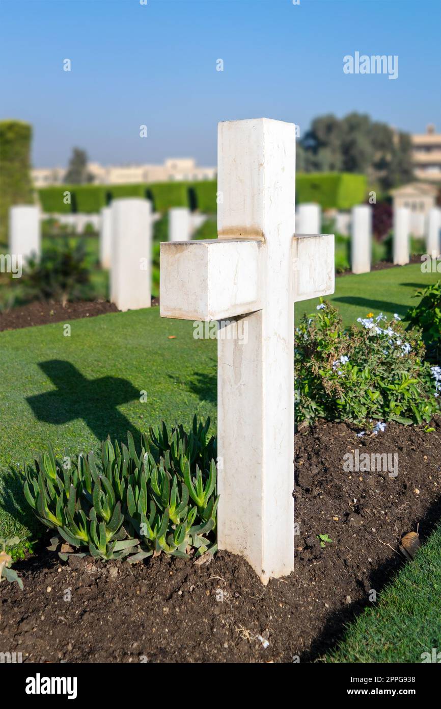 Cross tombstone at Heliopolis Commonwealth War Cemetery, Cairo, Egypt ...