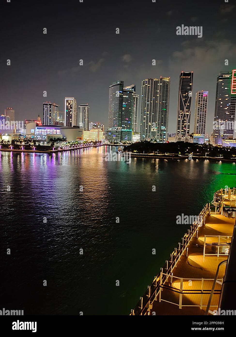 Miami city skyline panorama at dusk with urban skyscrapers and bridge ...
