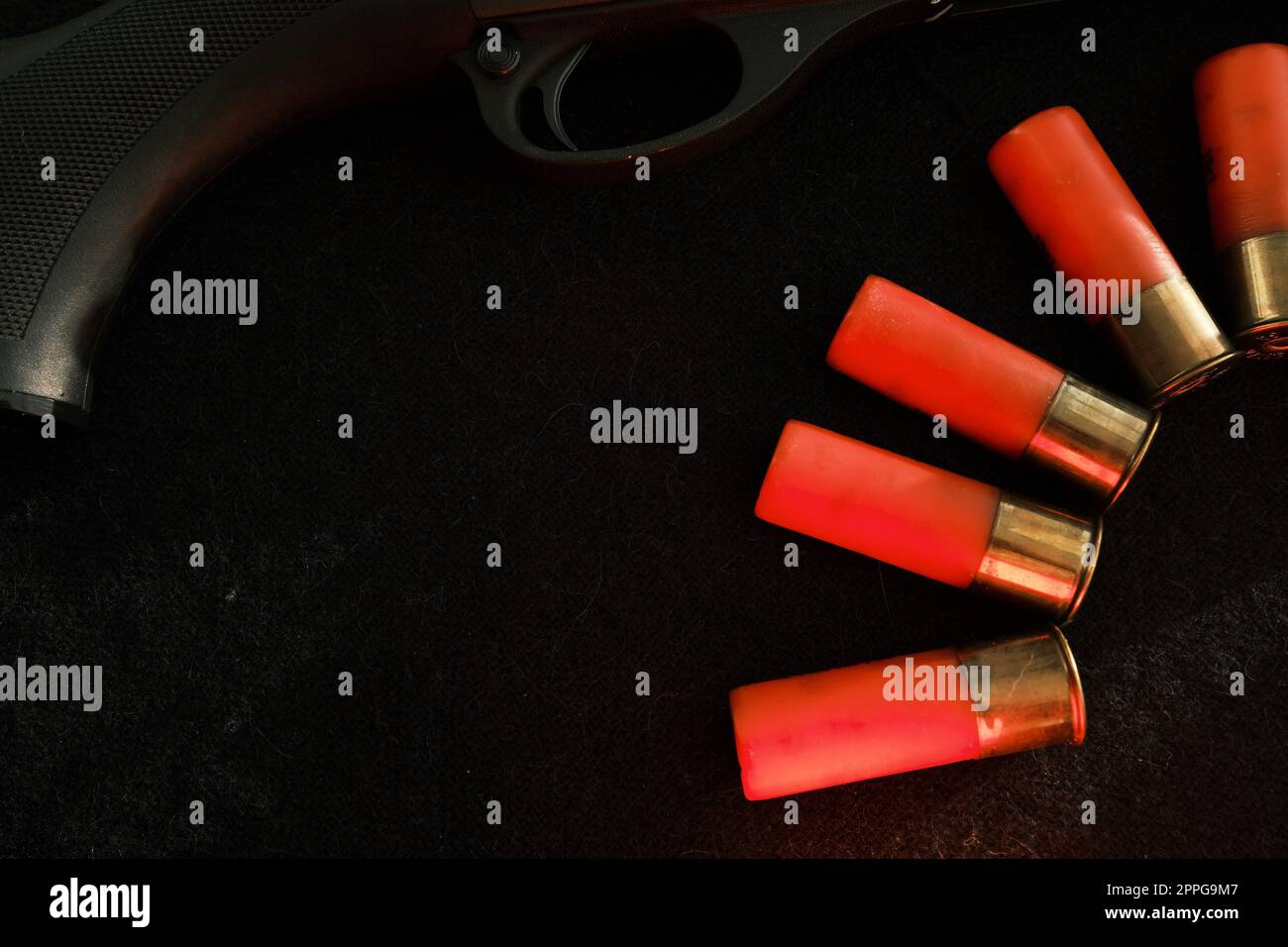 Trigger of a rifle on black background with red lightning with Shotgun ...