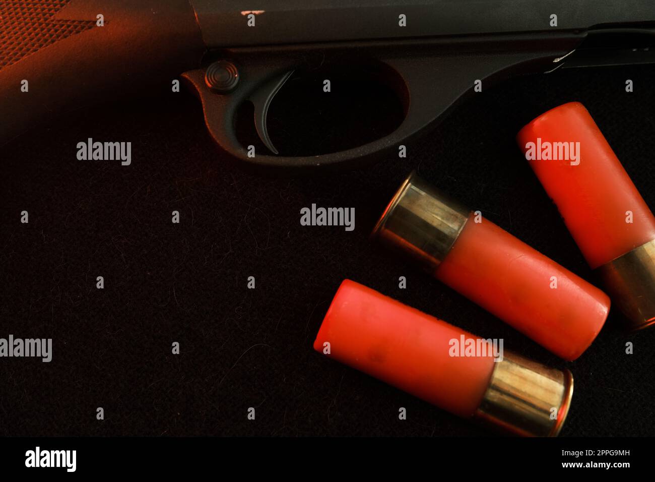 Trigger of a rifle on black background with red lightning with Shotgun ...