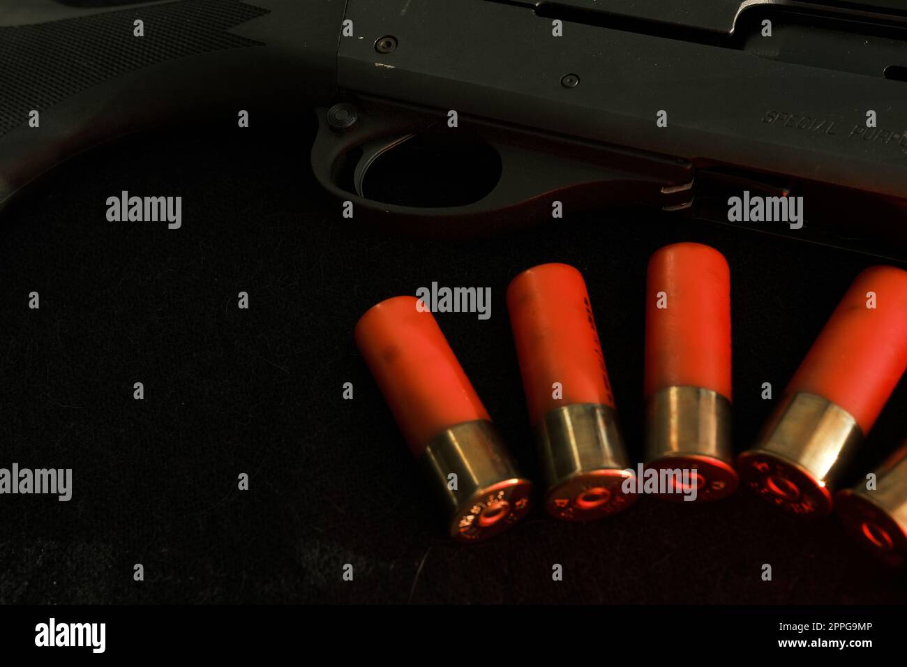 Trigger of a rifle on black background with red lightning with Shotgun ...